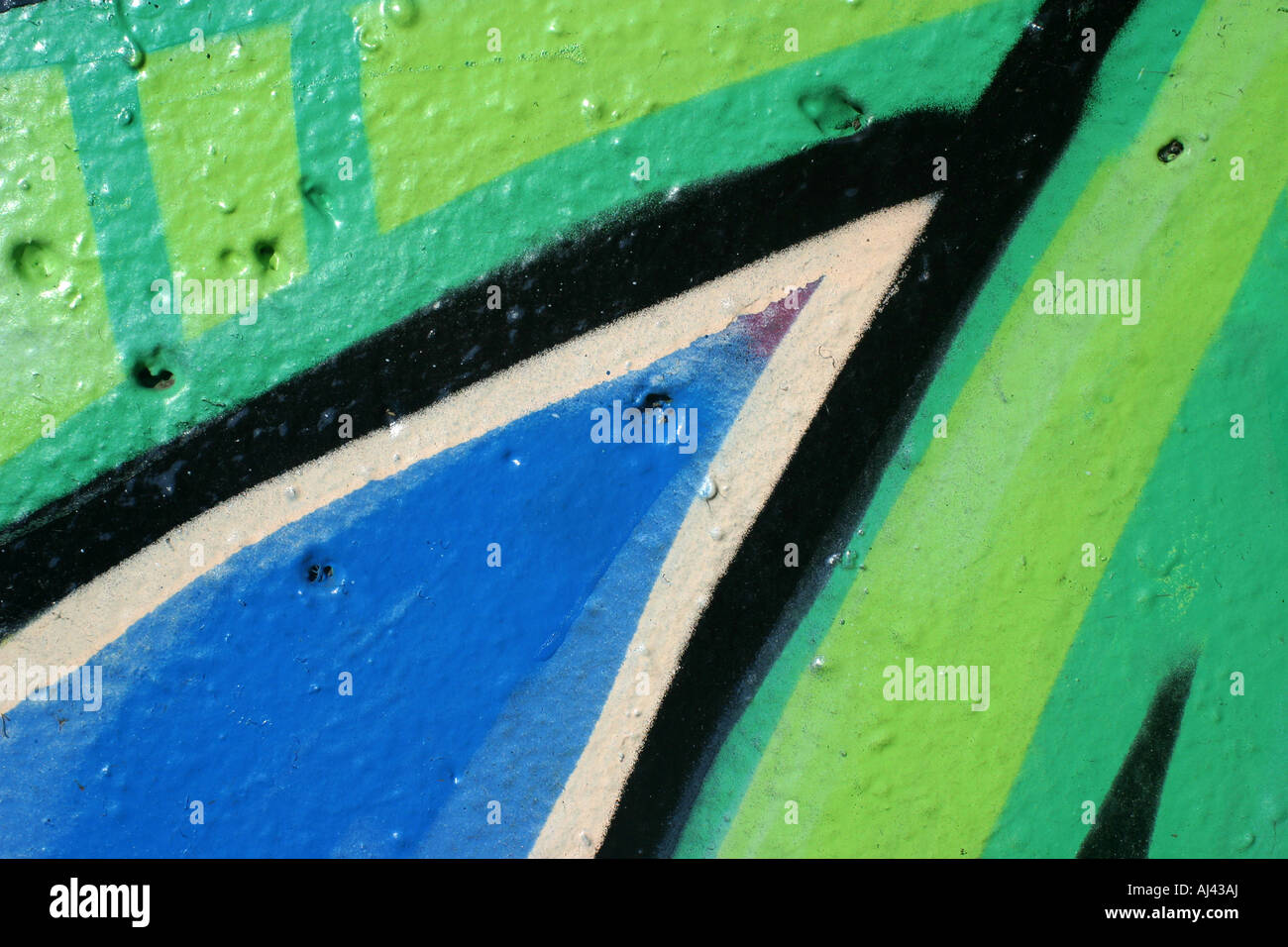 Close up graffiti tag paint work on a textured wall Stock Photo - Alamy