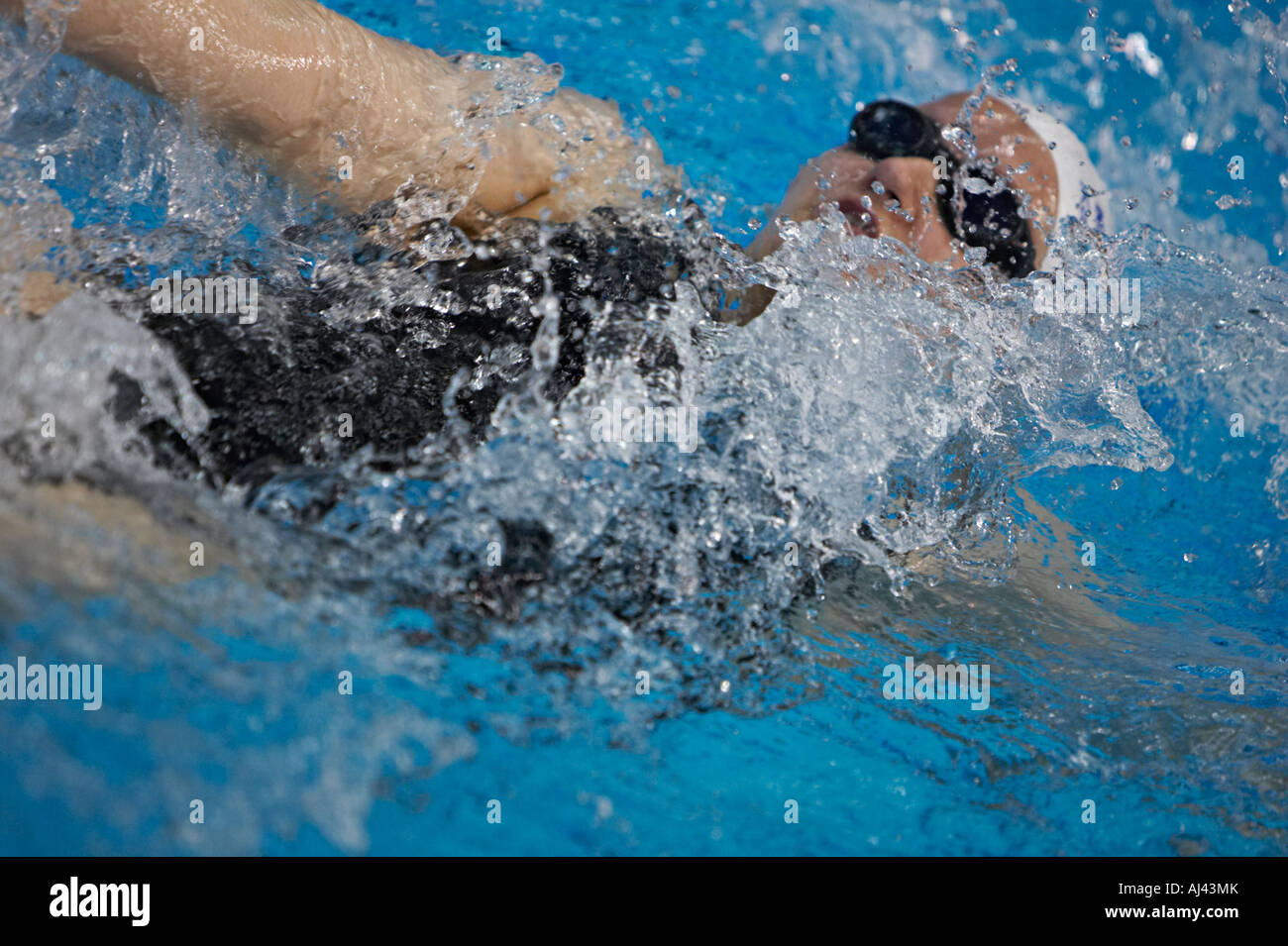 A female backstroke swimmer competing in the ASA National ...