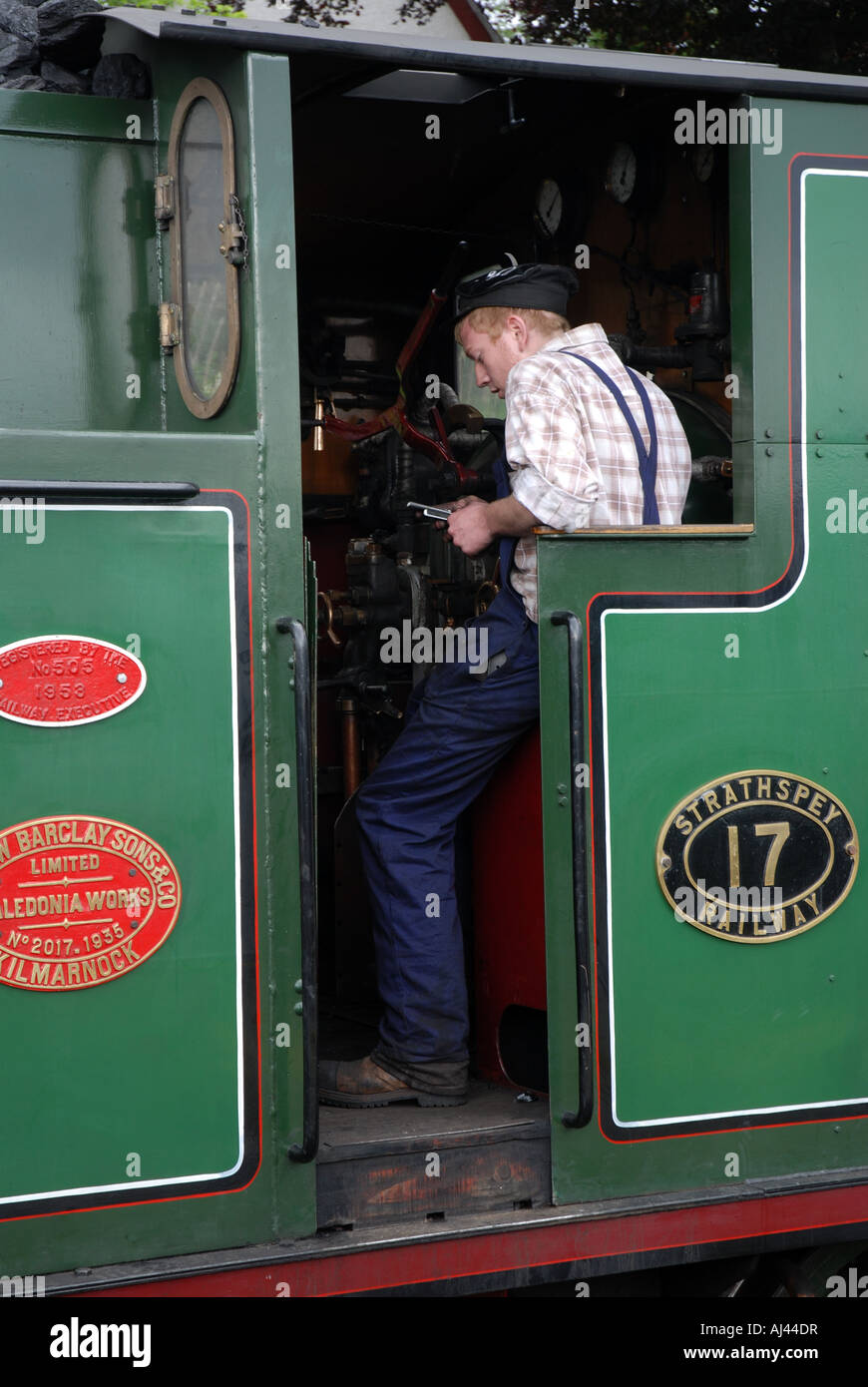 Engineer in steam locomotive of Strathspey stem railway historic ...