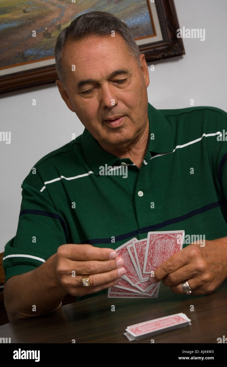 Senior playing solitaire game hi-res stock photography and images - Alamy