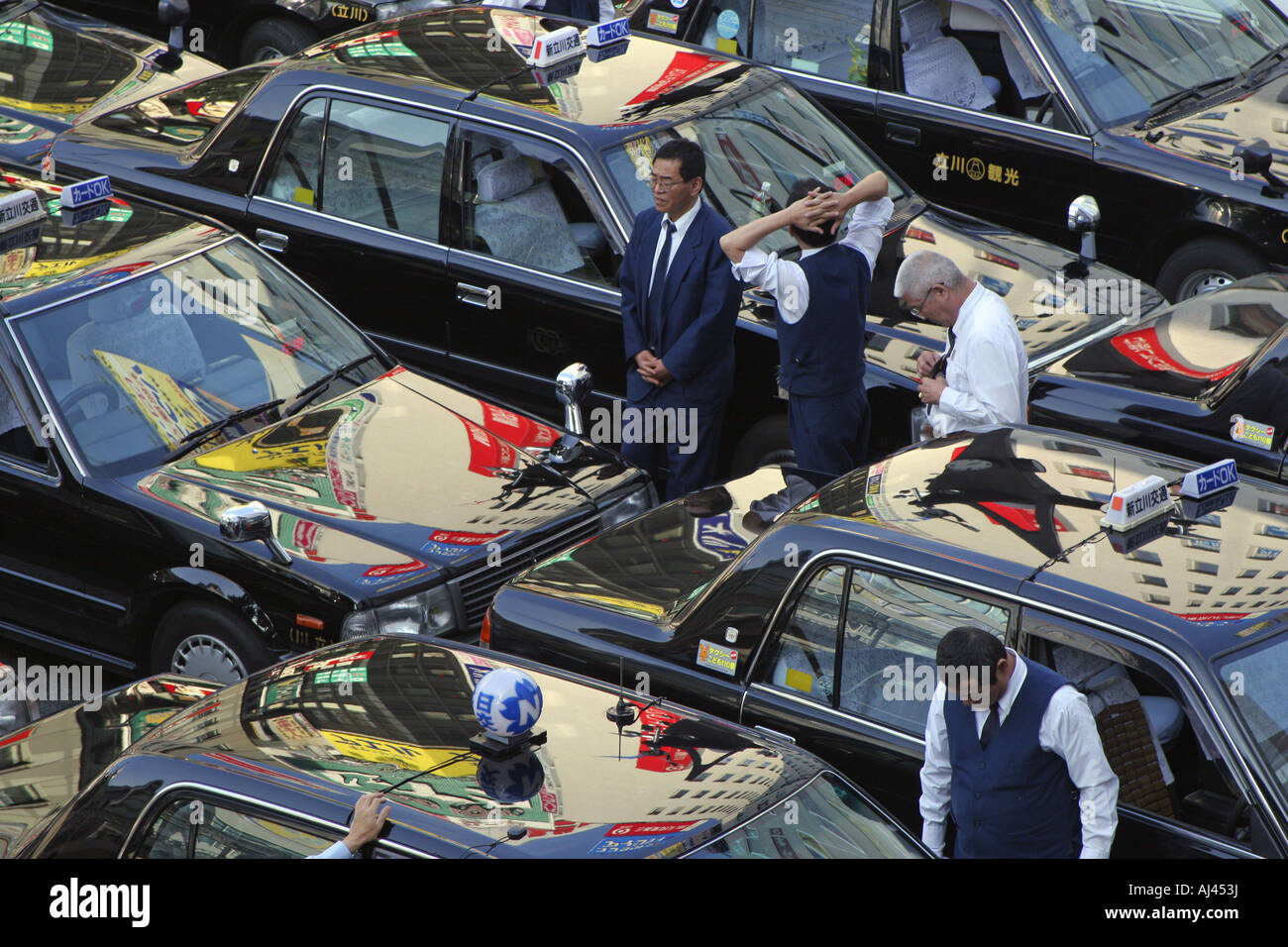 Taxis at waiting bay reflect cityscape of Tachikawa Tokyo Japan Stock ...