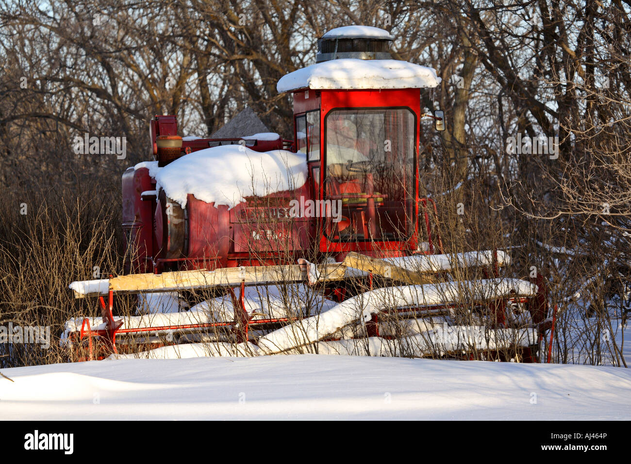 Farm machinery covered in snow Stock Photo - Alamy