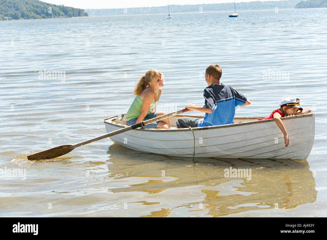 Boy Girl In Row Boat Stock Photos & Boy Girl In Row Boat Stock Images ...