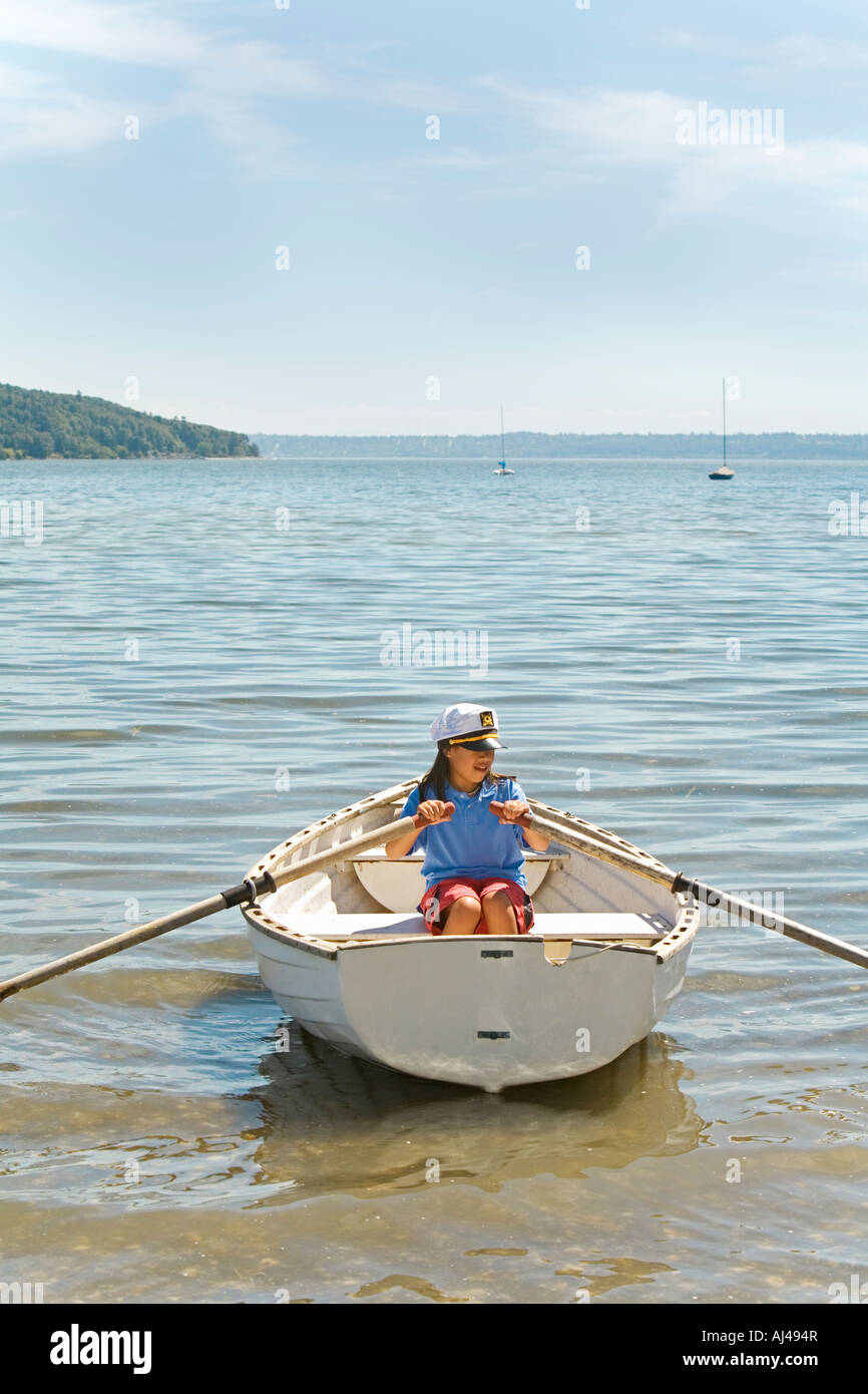 Young Asian girl in row boat Stock Photo - Alamy