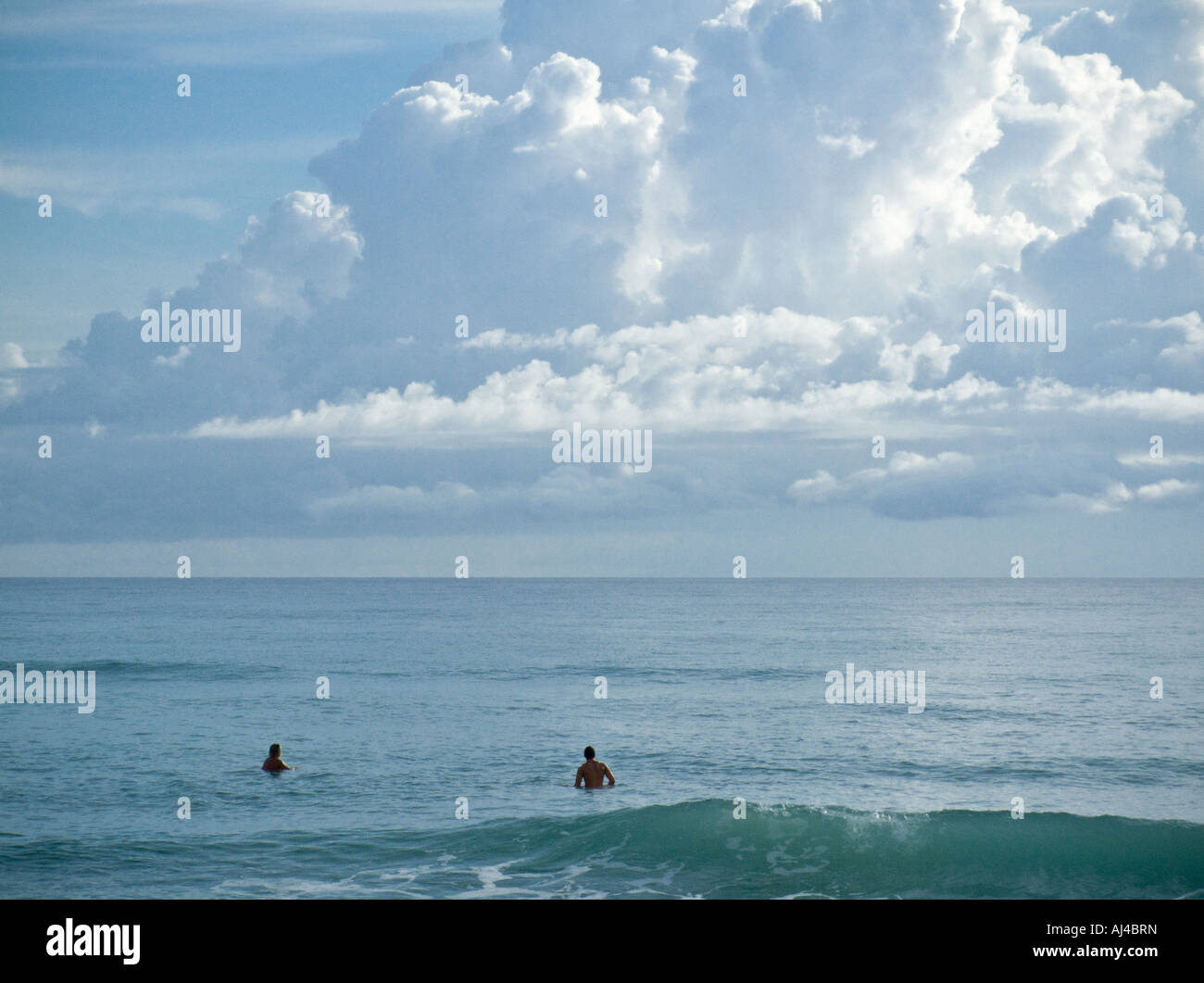 surfers waiting for wave early morning clouds cloudy recreation surfing ...