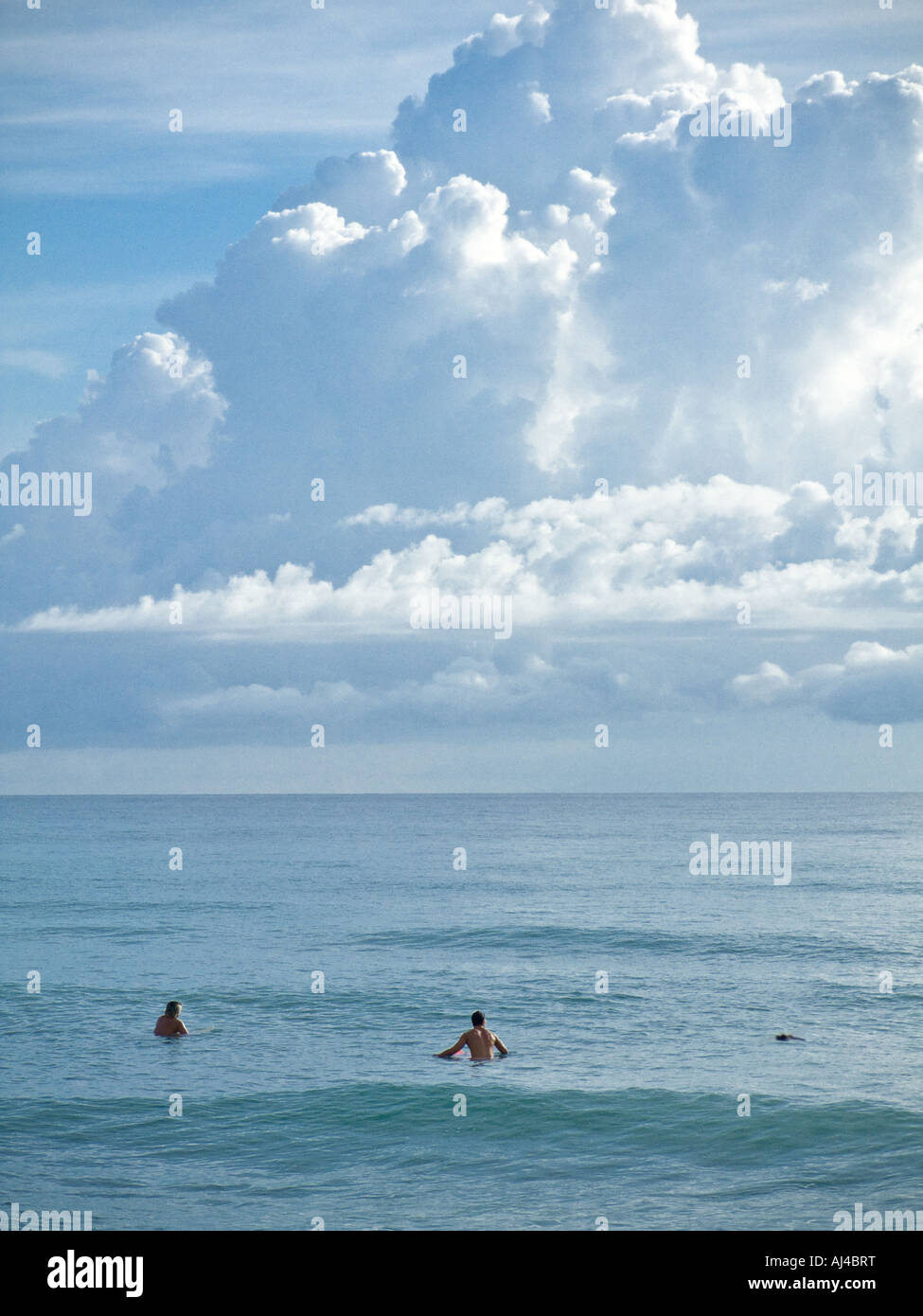 surfers waiting for wave early morning clouds cloudy recreation surfing ...