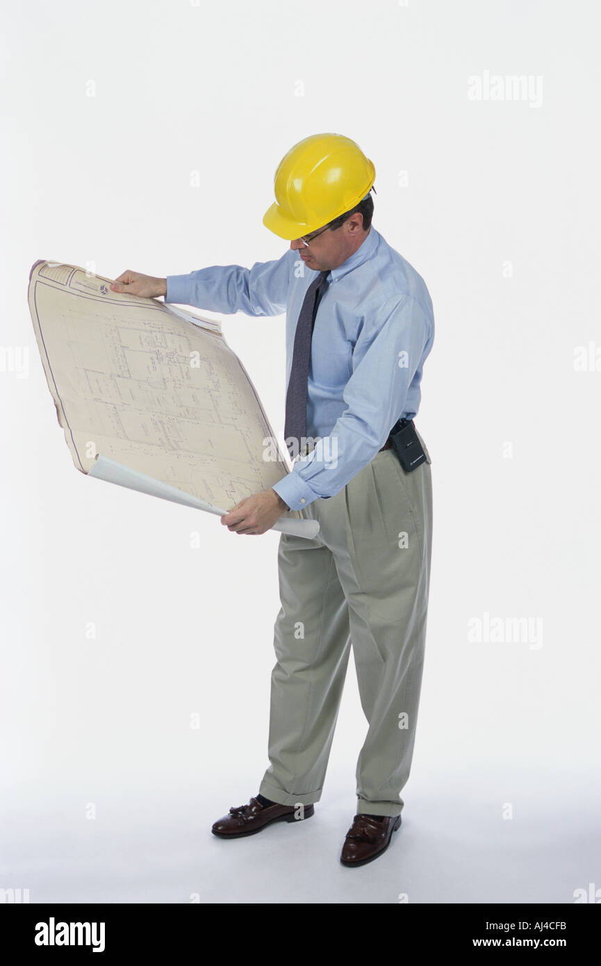 Foreman studying blueprints hi-res stock photography and images - Alamy