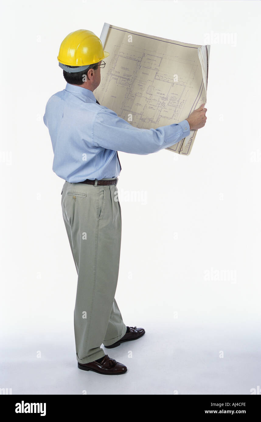 Foreman studying blueprints hi-res stock photography and images - Alamy