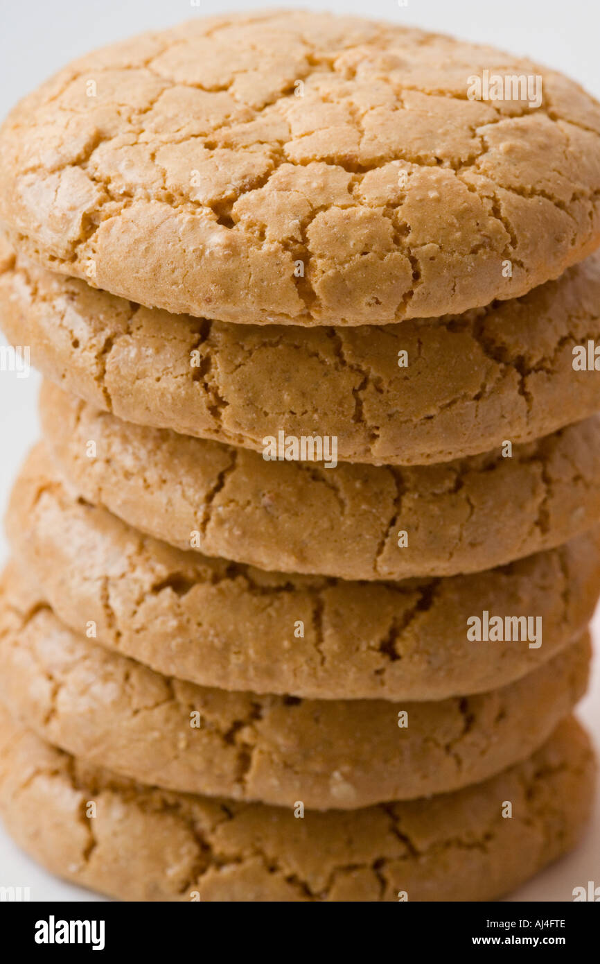 a pile of tasty plain cookies against white background Stock Photo - Alamy