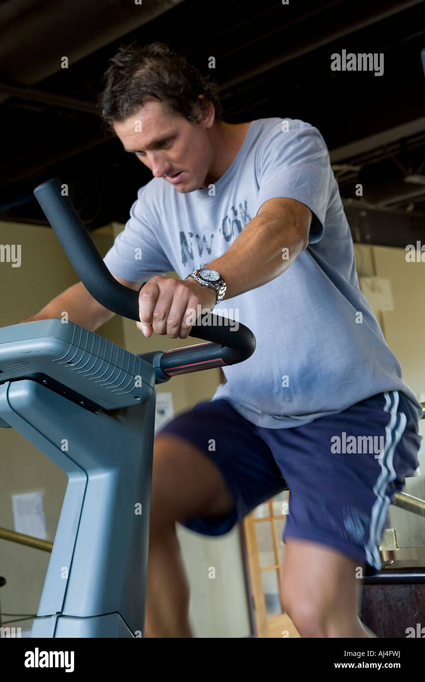 Fit male exercising in a gym Workout Stock Photo - Alamy