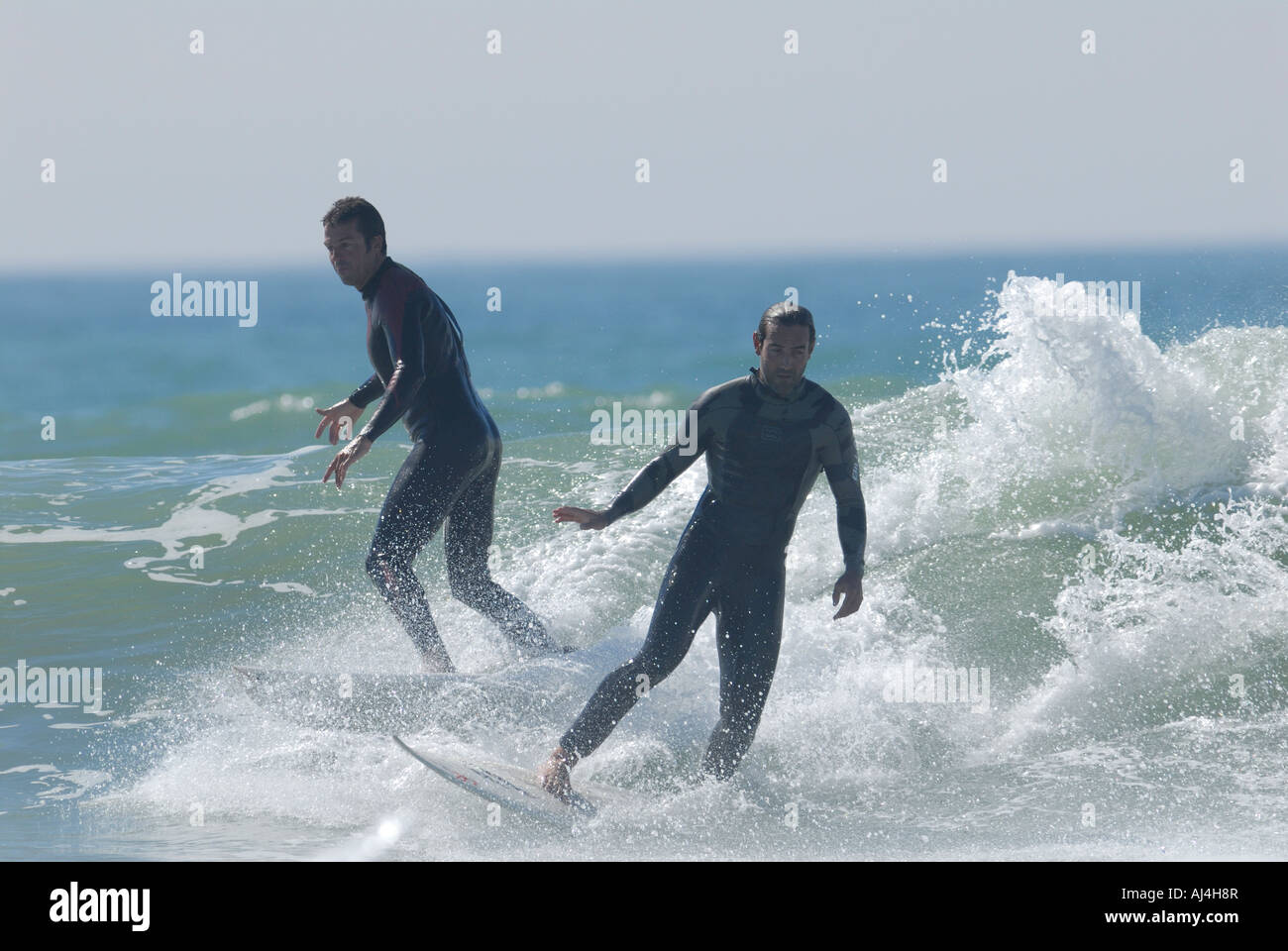 Surfers wave same hi-res stock photography and images - Alamy
