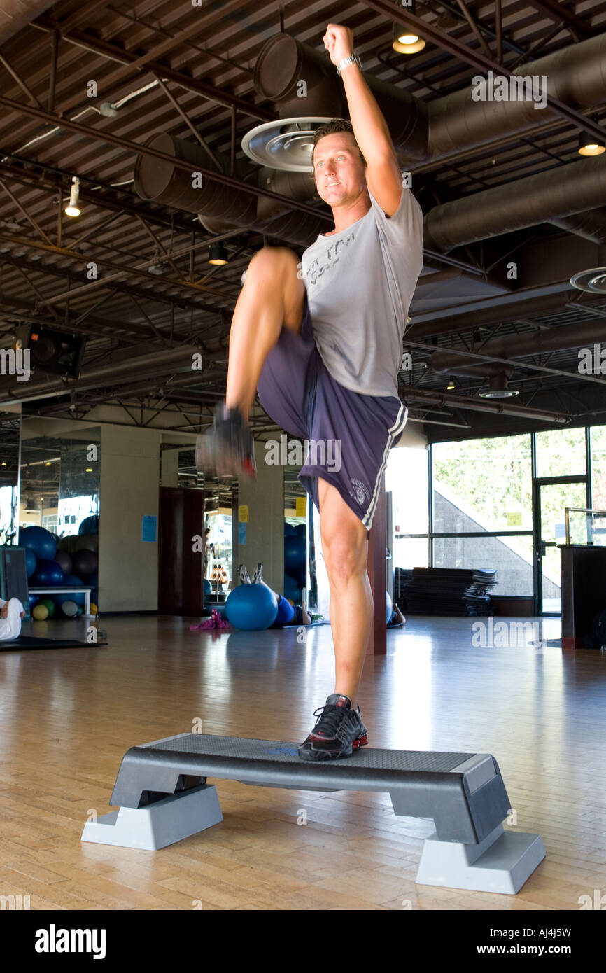 Fit male exercising in a gym Workout Stock Photo - Alamy