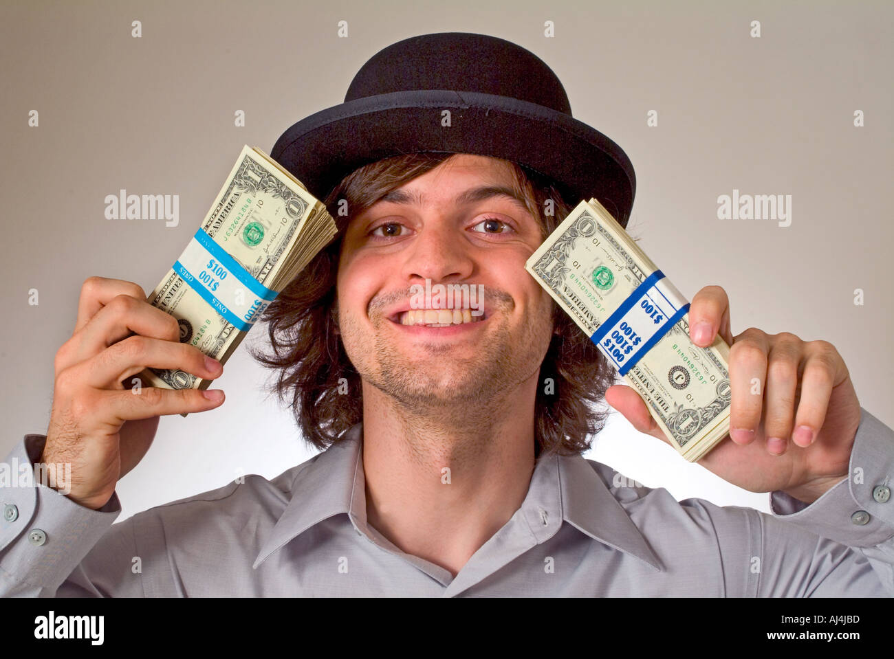 Fistful of money hi-res stock photography and images - Alamy