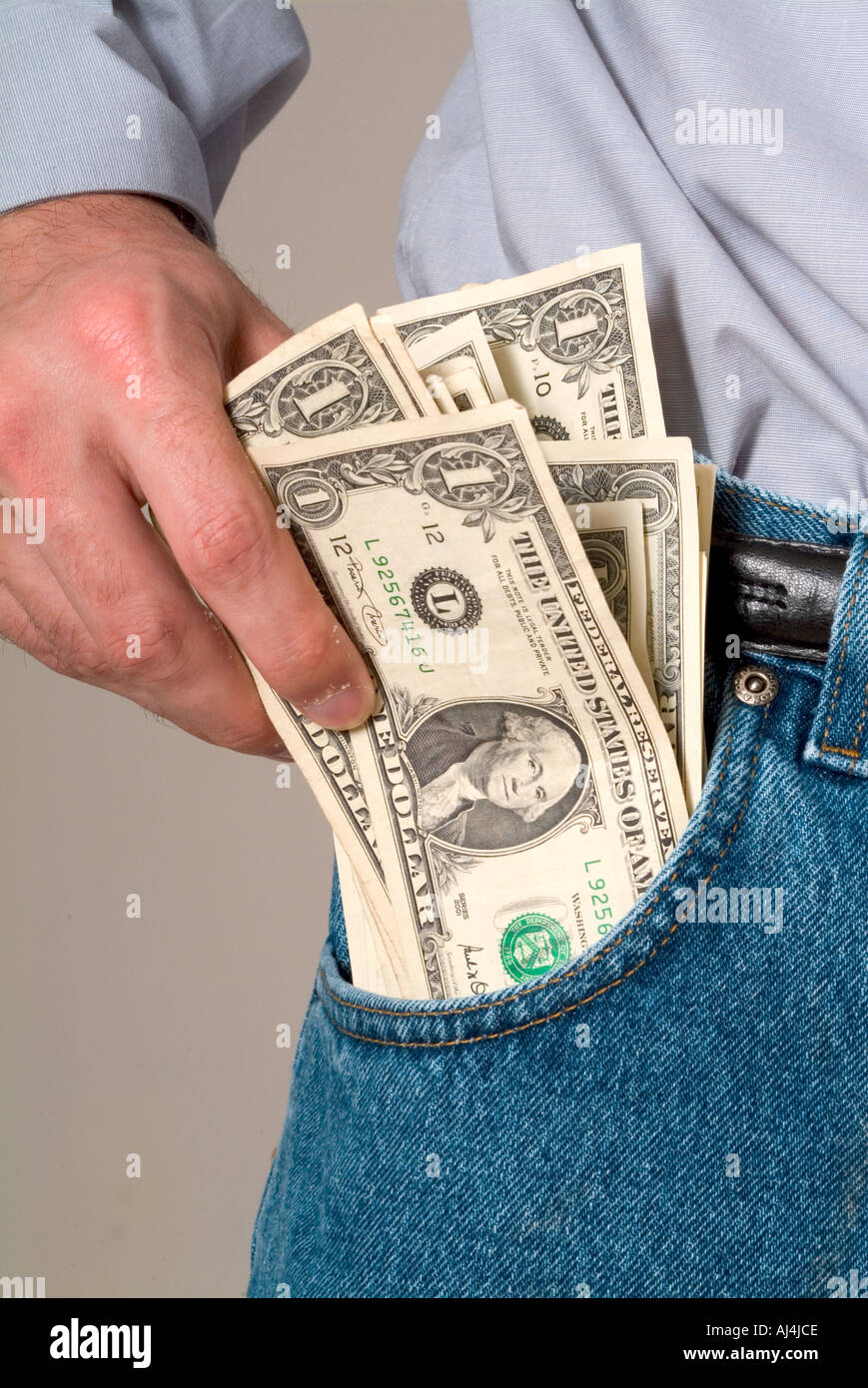 Cash stuffing hi-res stock photography and images - Alamy