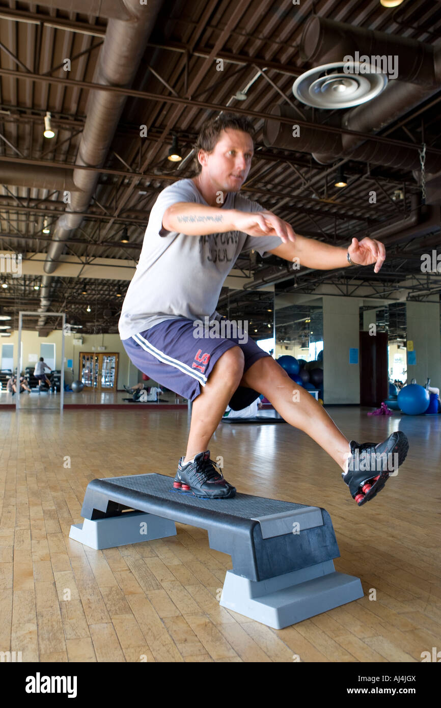 Fit male exercising in a gym Workout Stock Photo - Alamy