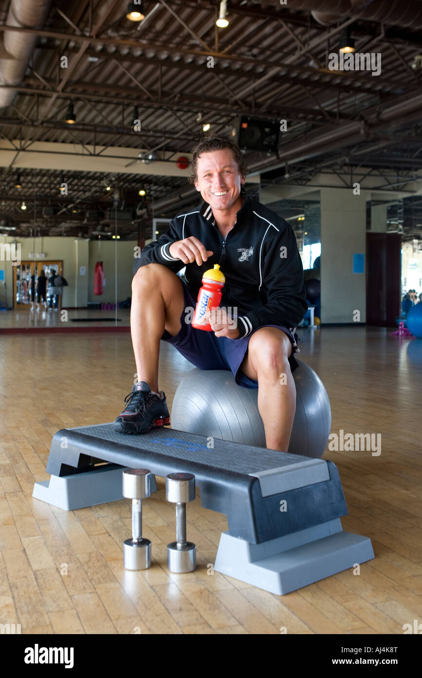 Fit male exercising in a gym Workout Stock Photo - Alamy