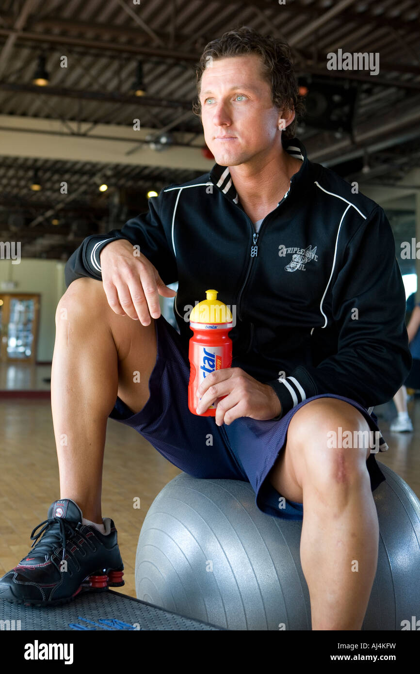 Fit male exercising in a gym Workout Stock Photo - Alamy
