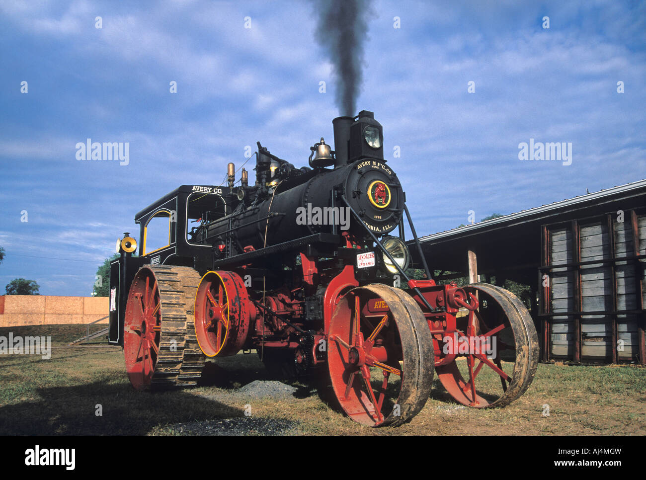 Antique Avery Company Steam Tractor Belching Smoke from its Smokestack ...