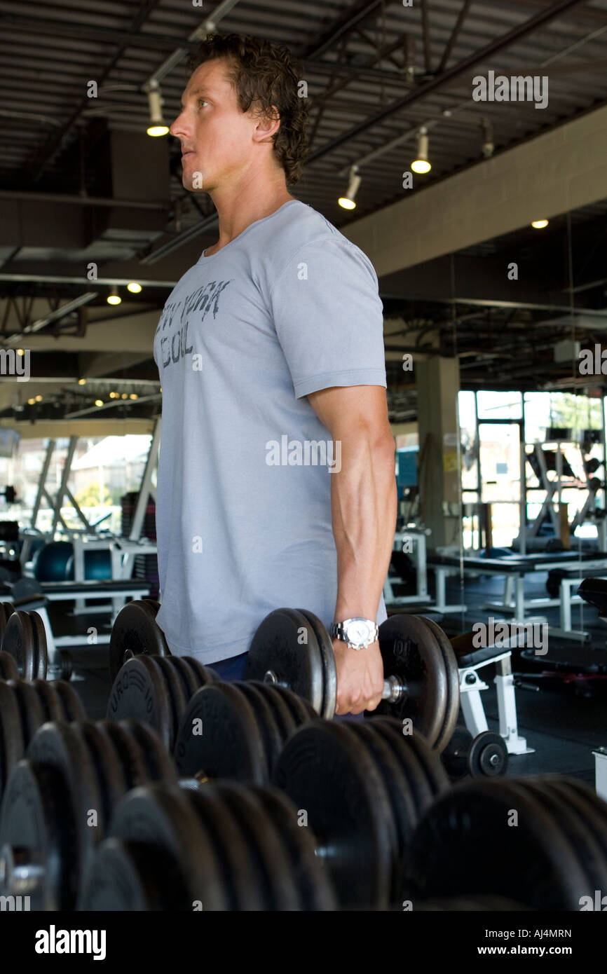 Fit male exercising in a gym Workout Stock Photo - Alamy