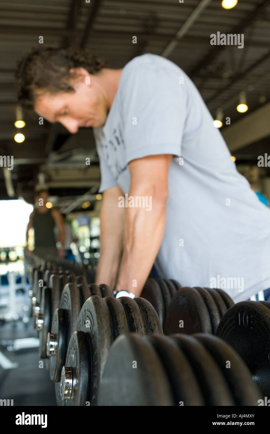 Fit male exercising in a gym Workout Stock Photo - Alamy