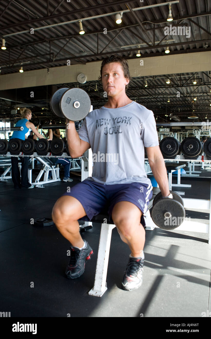 Fit male exercising in a gym Workout Stock Photo - Alamy