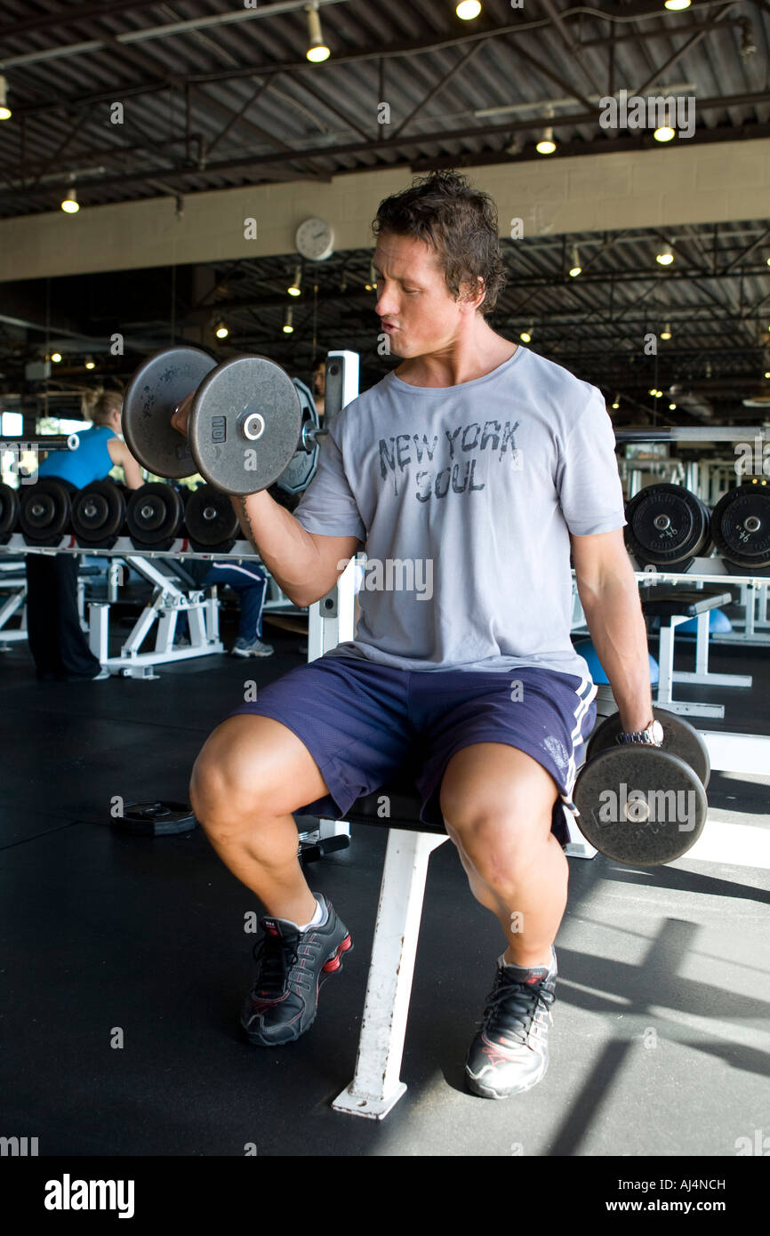 Fit male exercising in a gym Workout Stock Photo - Alamy