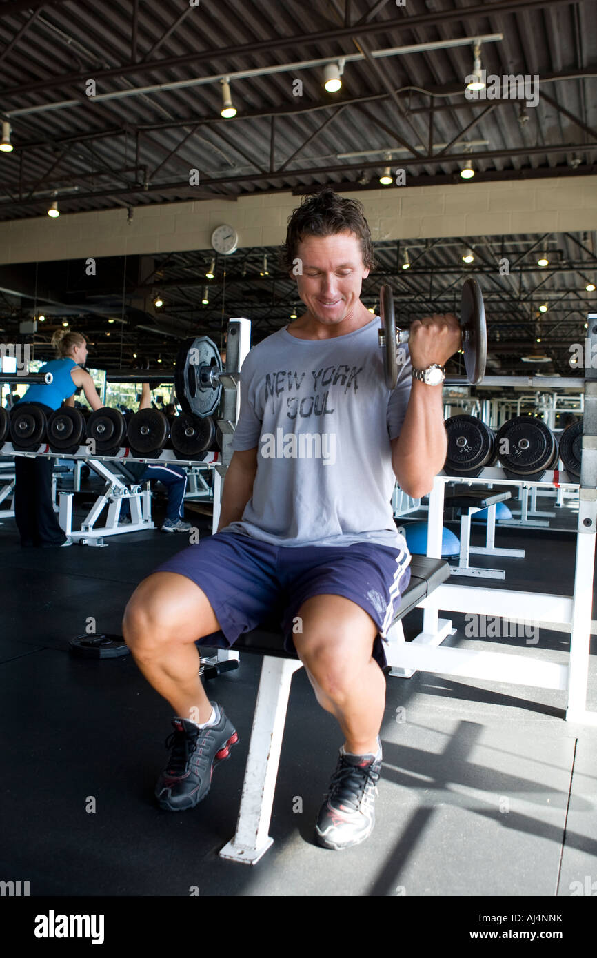 Fit male exercising in a gym Workout Stock Photo - Alamy