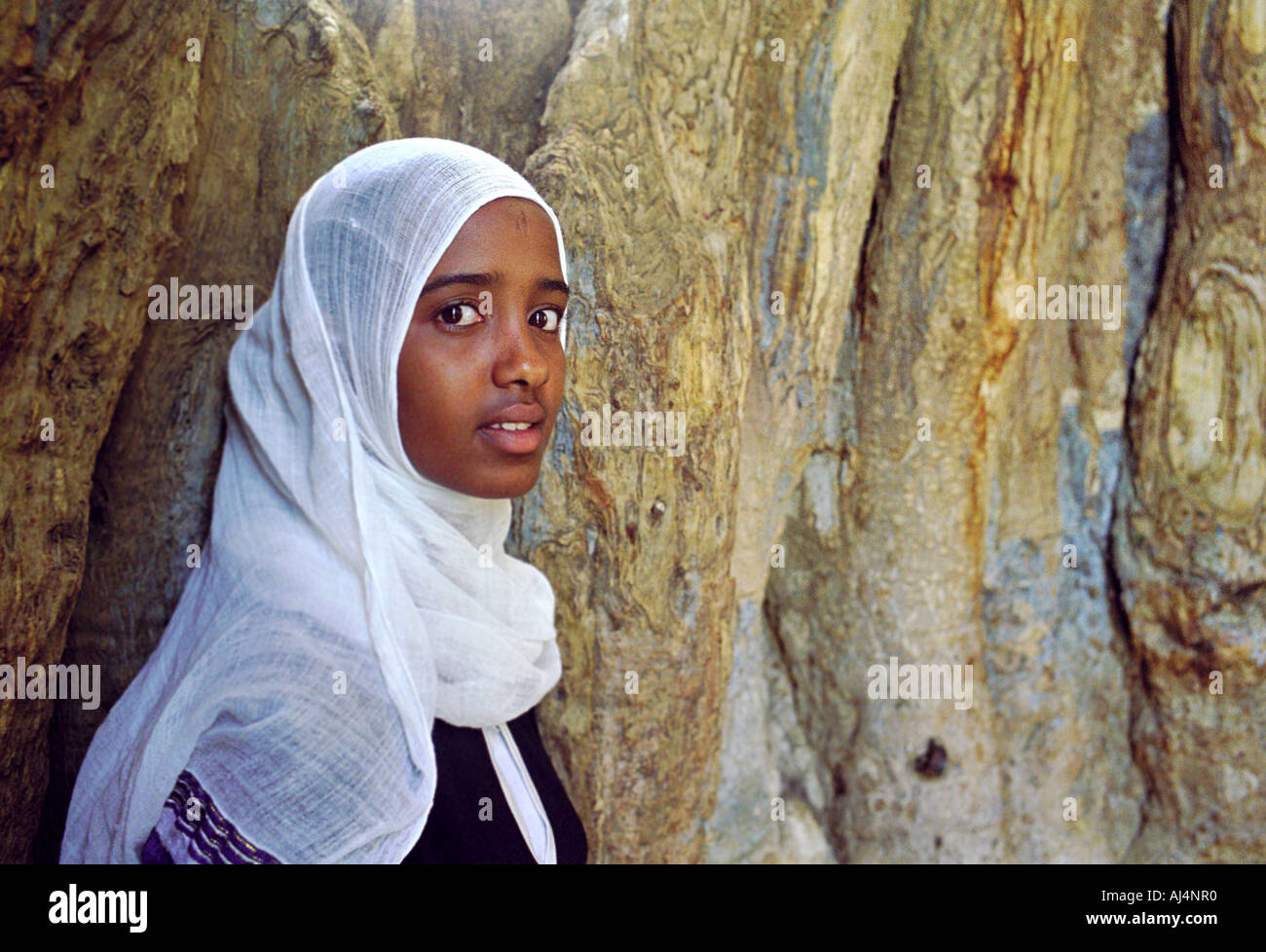 Young woman at the shrine of St Mariam Dearit inside a baobab tree ...