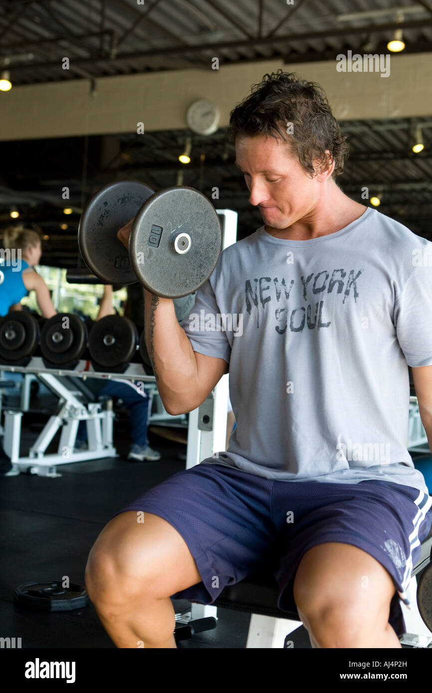 Fit male exercising in a gym Workout Stock Photo - Alamy