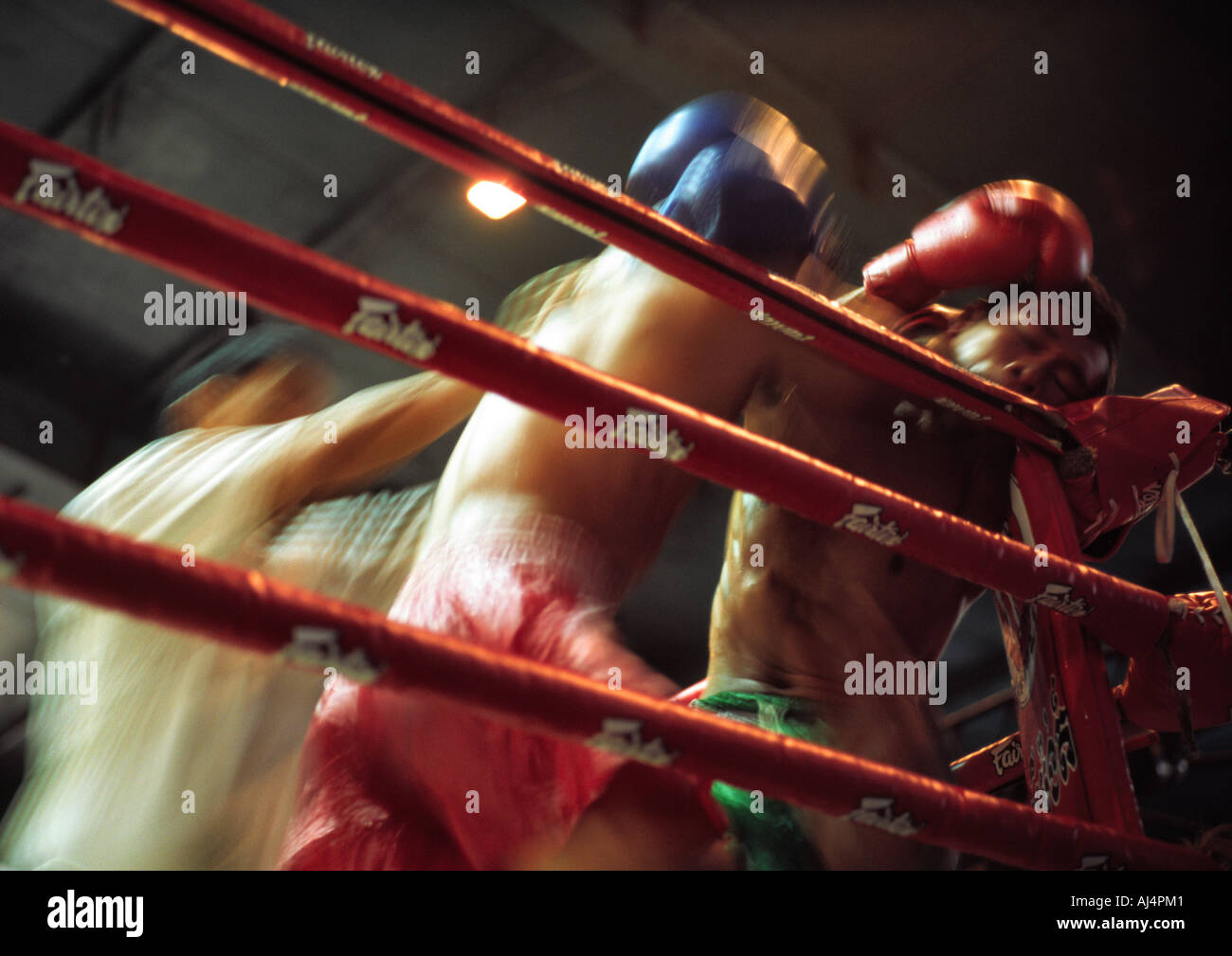 A referee intervenes in a Khmer kickboxing match Phnom Penh Cambodia ...