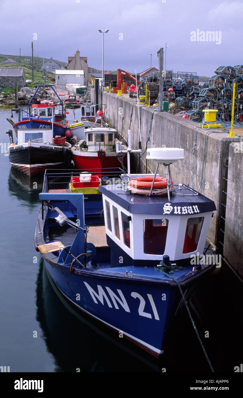 Sunday morning finds the fishing boats at their moorings in Berneray ...