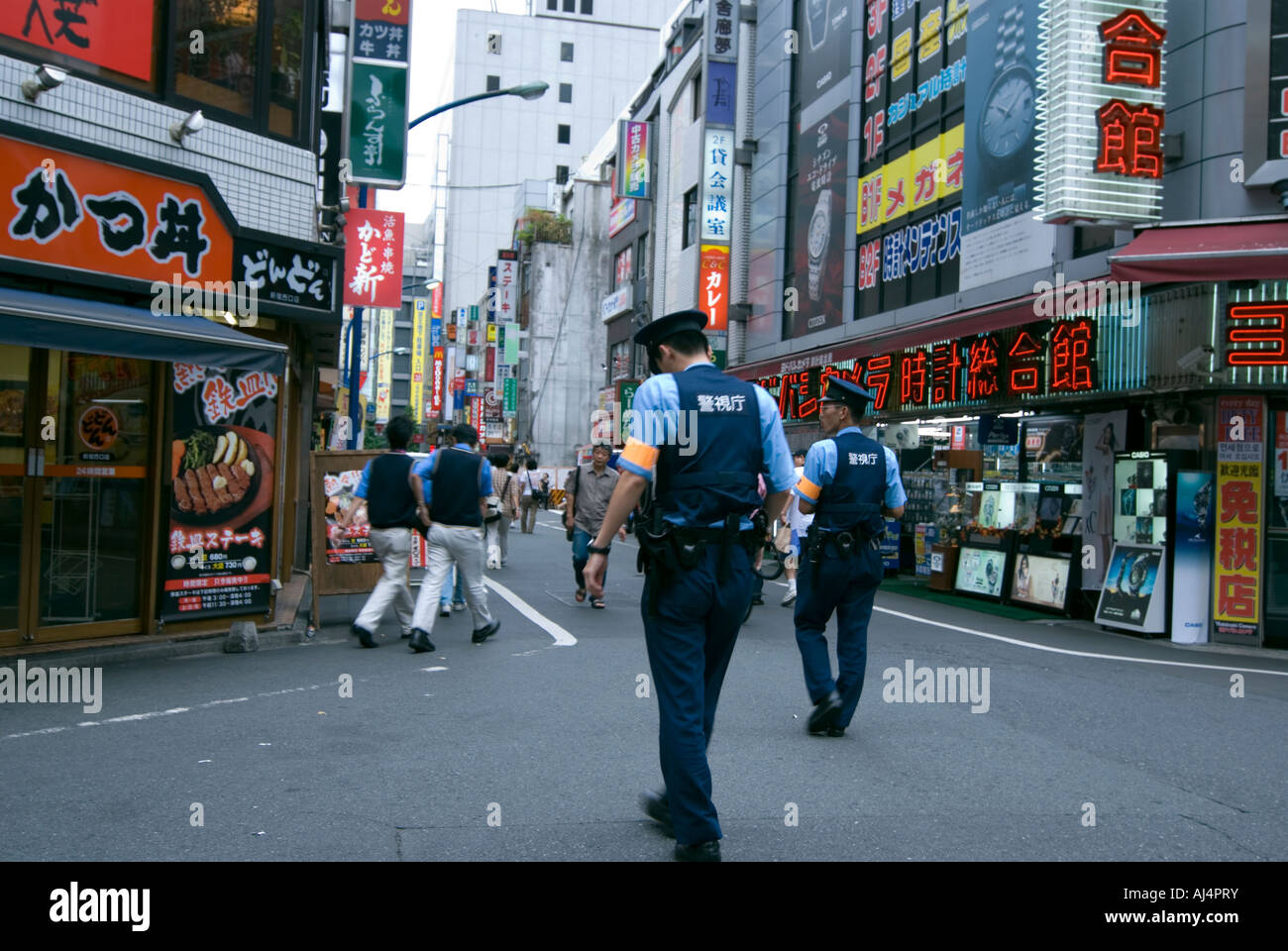 Tokyo police crowd hi-res stock photography and images - Alamy