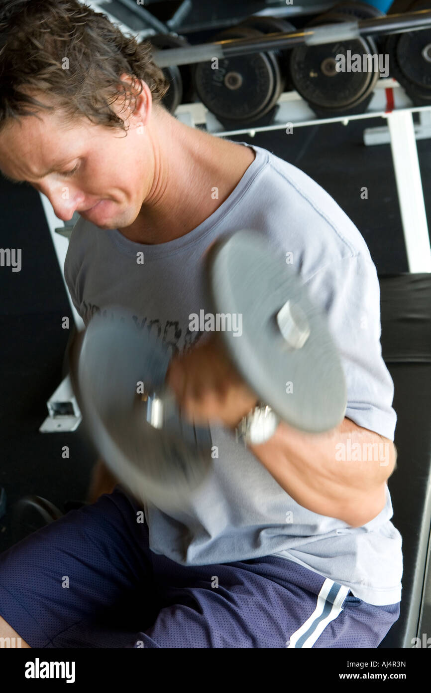 Fit male exercising in a gym Workout Stock Photo - Alamy