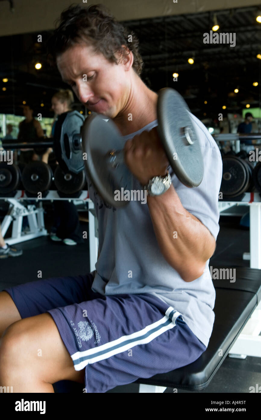 Fit male exercising in a gym Workout Stock Photo - Alamy
