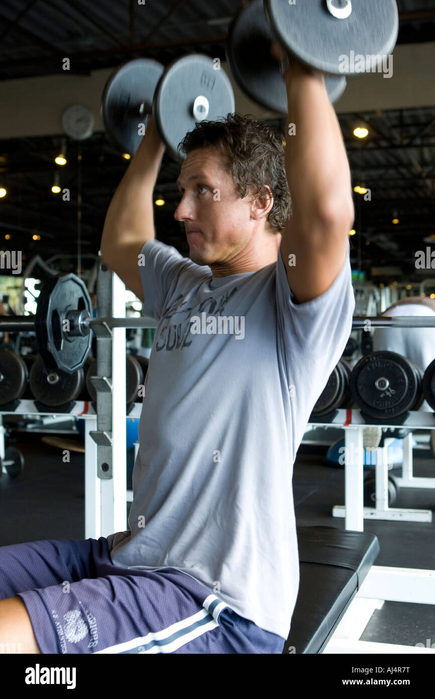 Fit male exercising in a gym Workout Stock Photo - Alamy