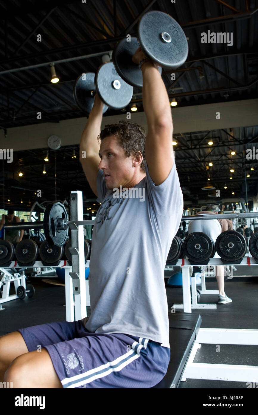 Fit male exercising in a gym Workout Stock Photo - Alamy