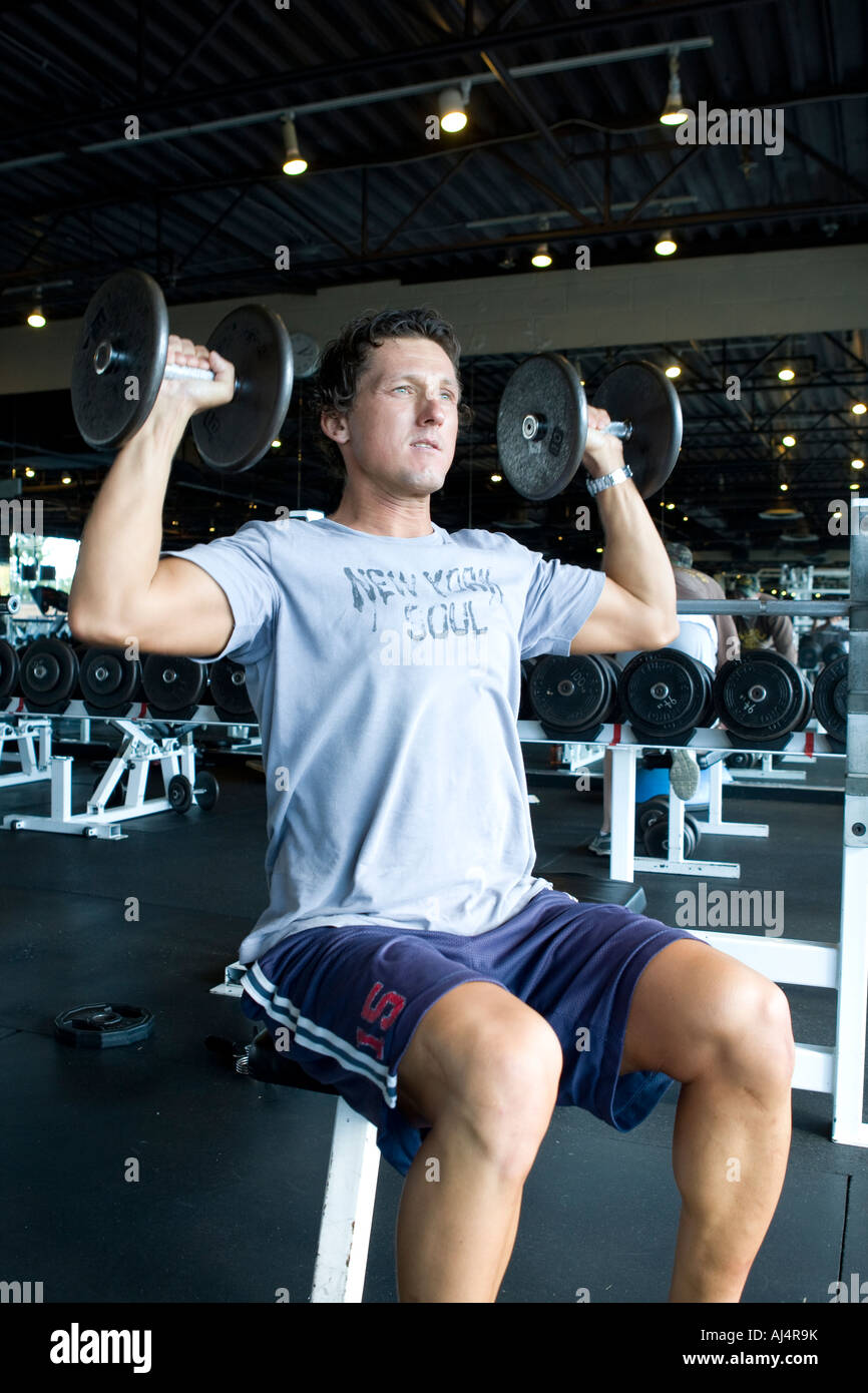 Fit male exercising in a gym Workout Stock Photo - Alamy