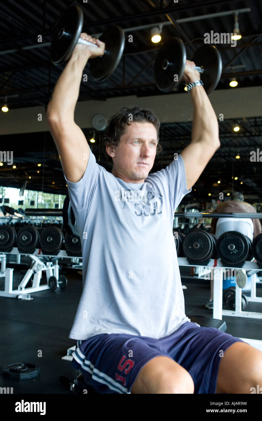 Fit male exercising in a gym Workout Stock Photo - Alamy