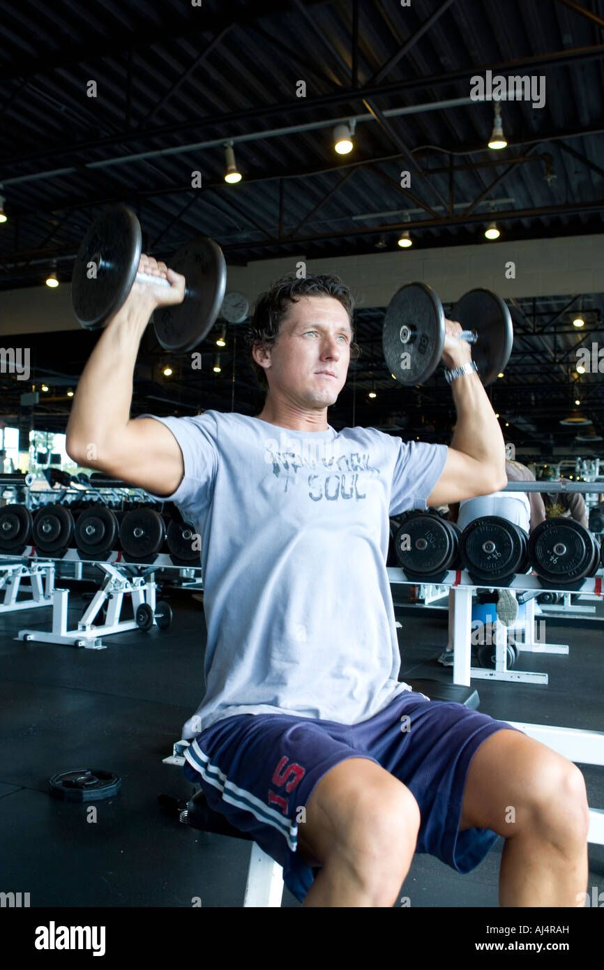 Fit male exercising in a gym Workout Stock Photo - Alamy