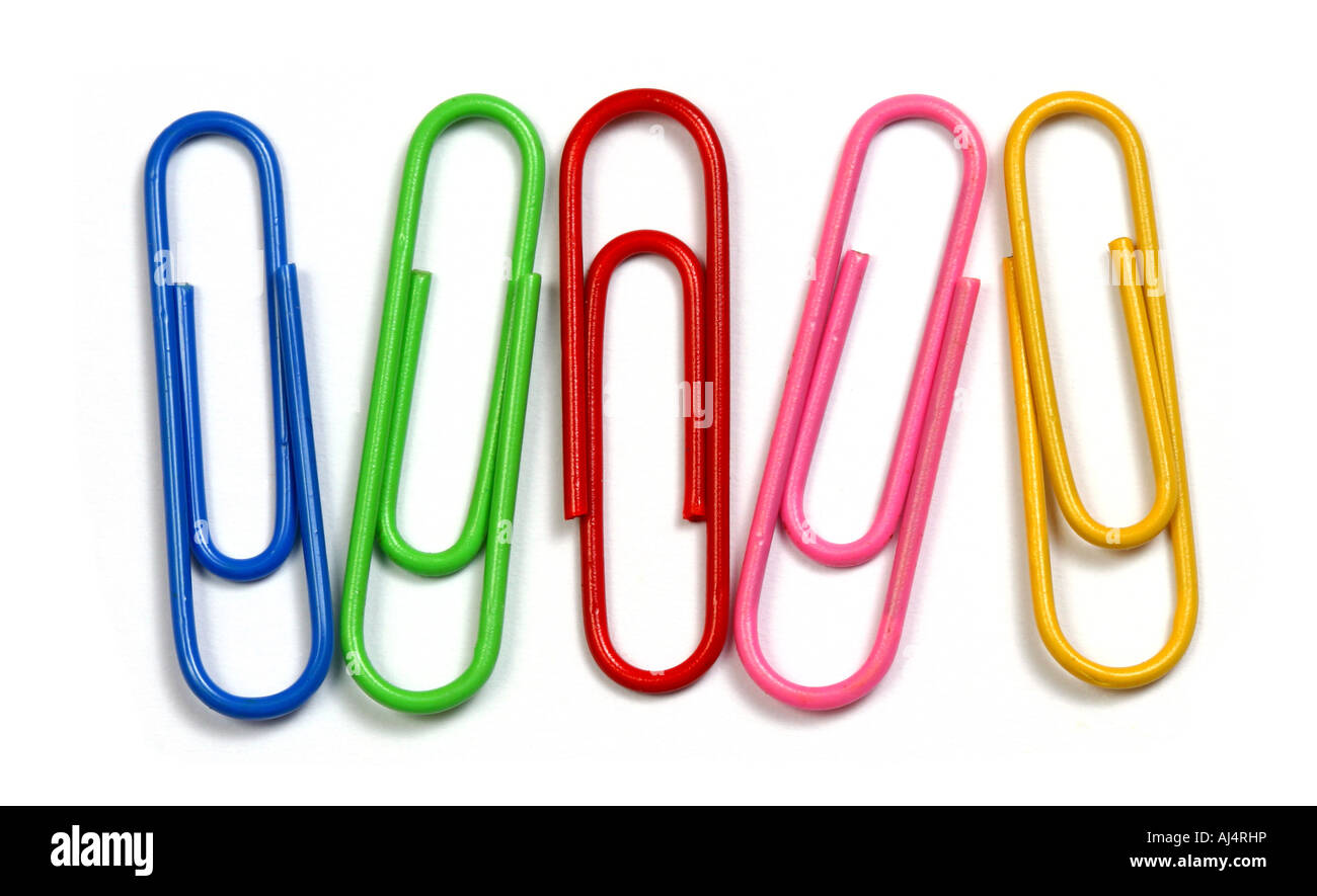 Colored clips over a white background Stock Photo - Alamy