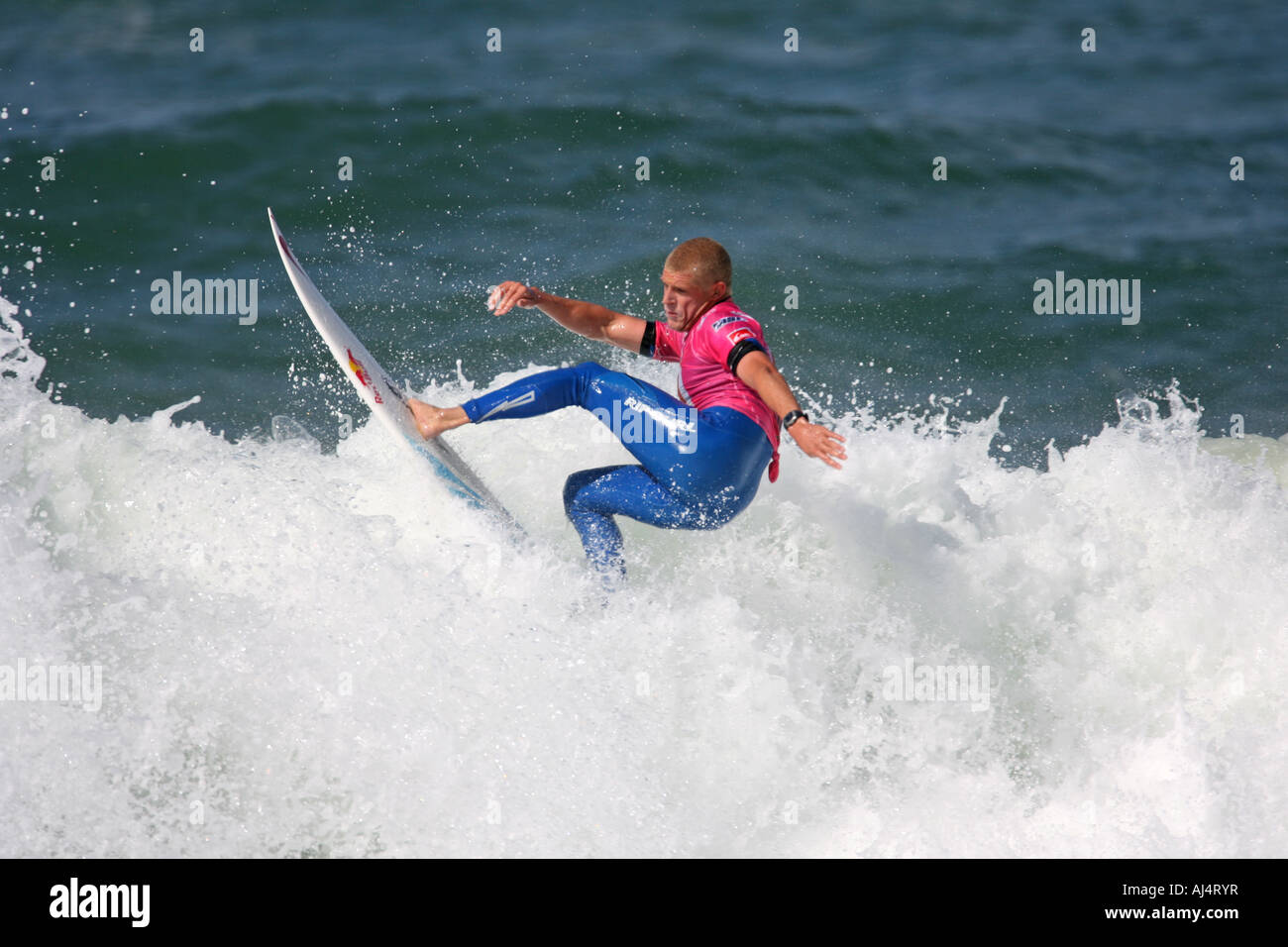 A Surfer rides a Wave Stock Photo - Alamy