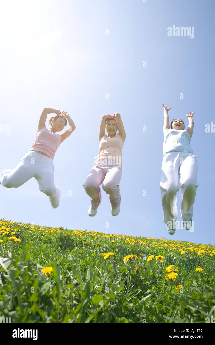 Japanese women jumping for hi-res stock photography and images - Alamy