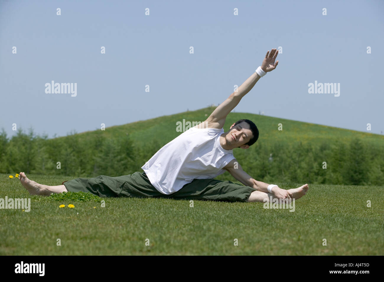 Japanese man stretching arms hi-res stock photography and images - Alamy