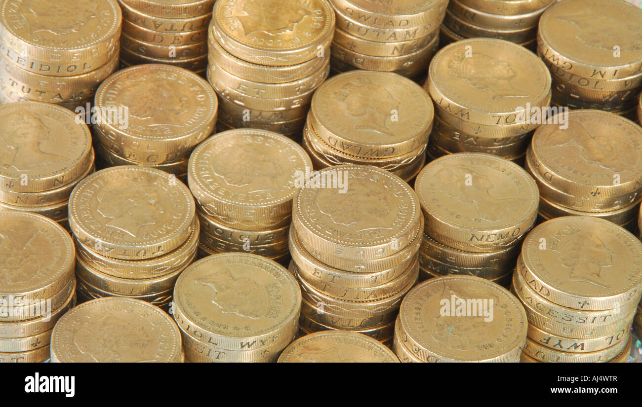 Lots of pound coins hi-res stock photography and images - Alamy