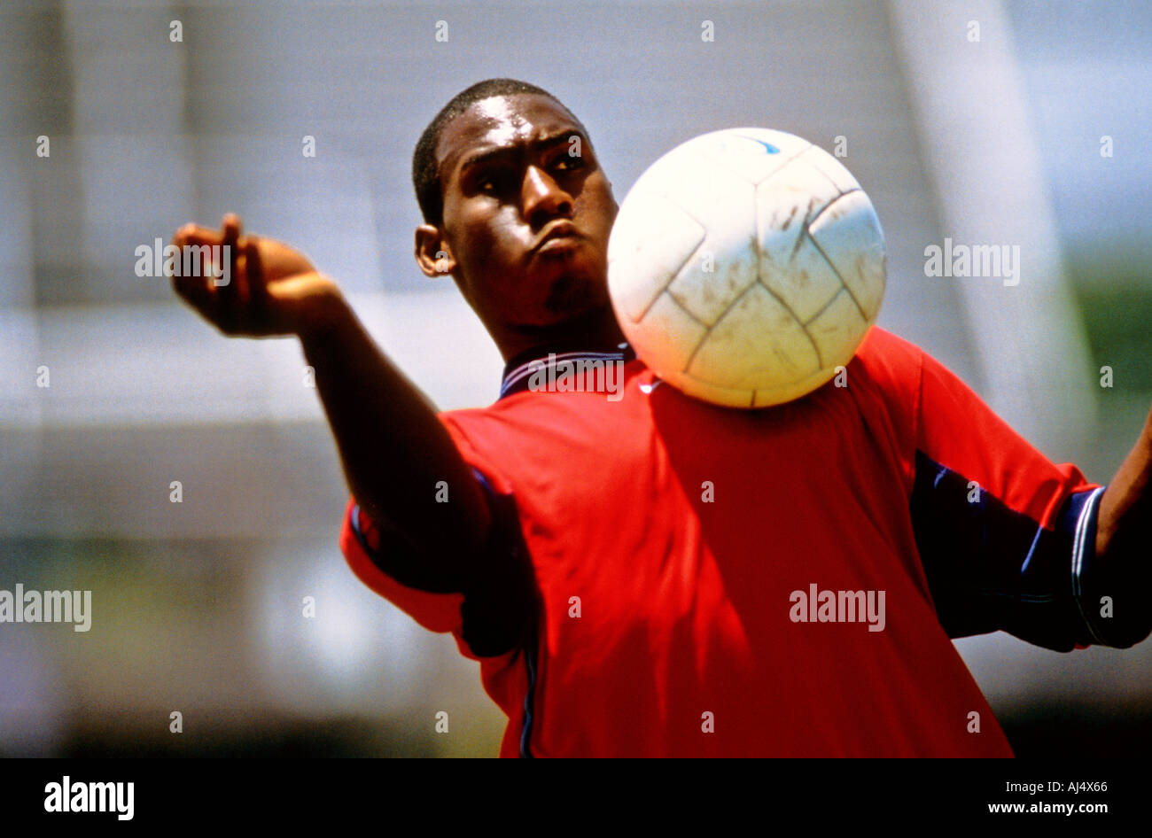 Soccer ball off chest Stock Photo - Alamy Soccer ball off chest Stock Photo - Alamy