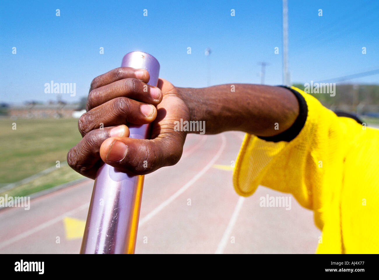 Passing the baton Stock Photo - Alamy