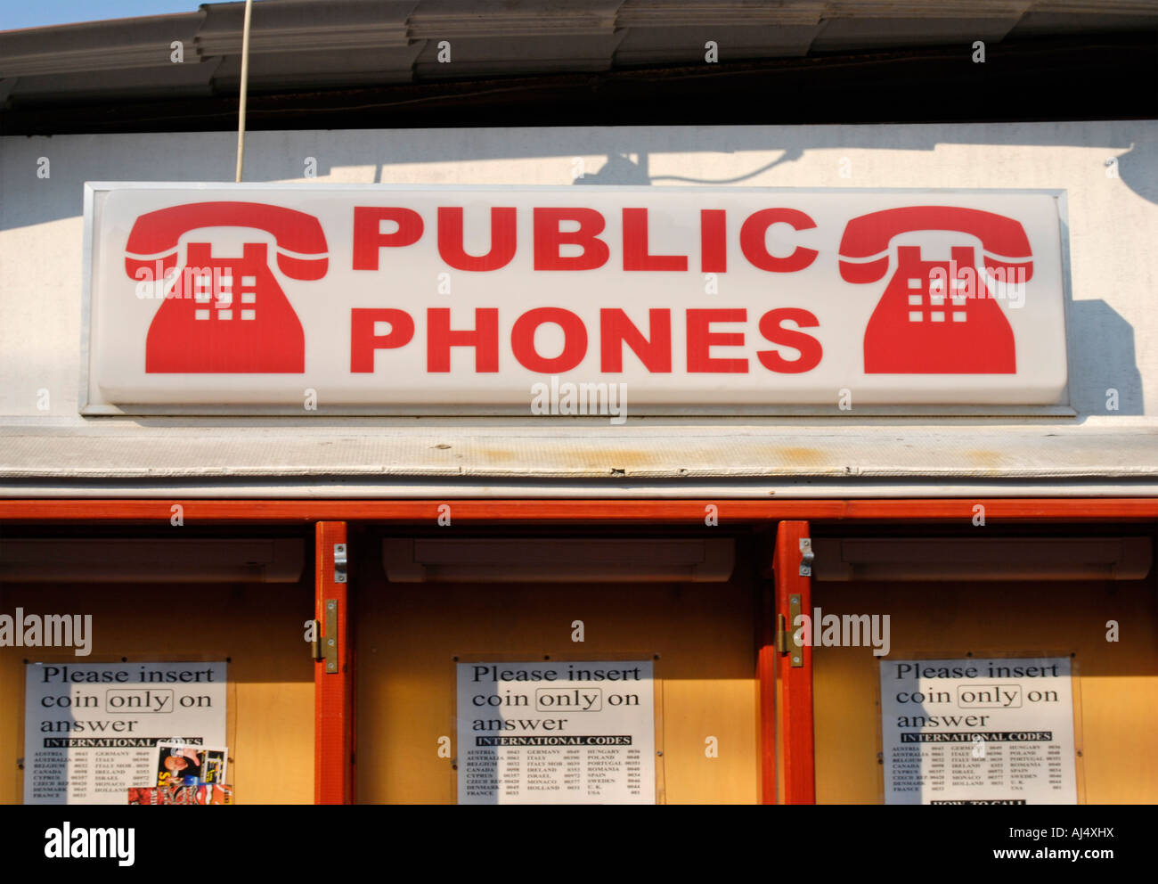 public phones sign Stock Photo - Alamy