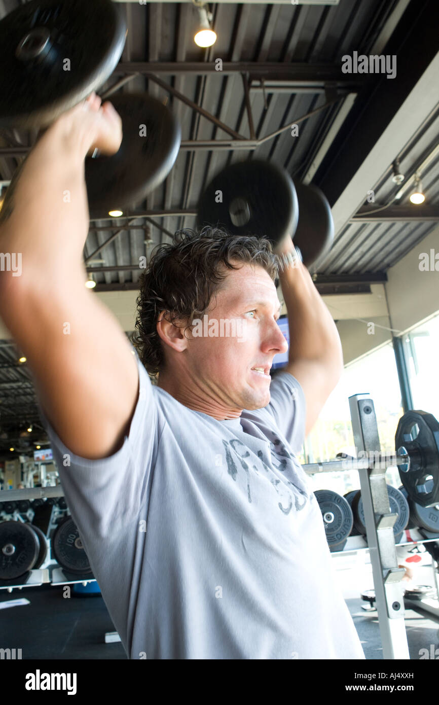 Fit male exercising in a gym Workout Stock Photo - Alamy