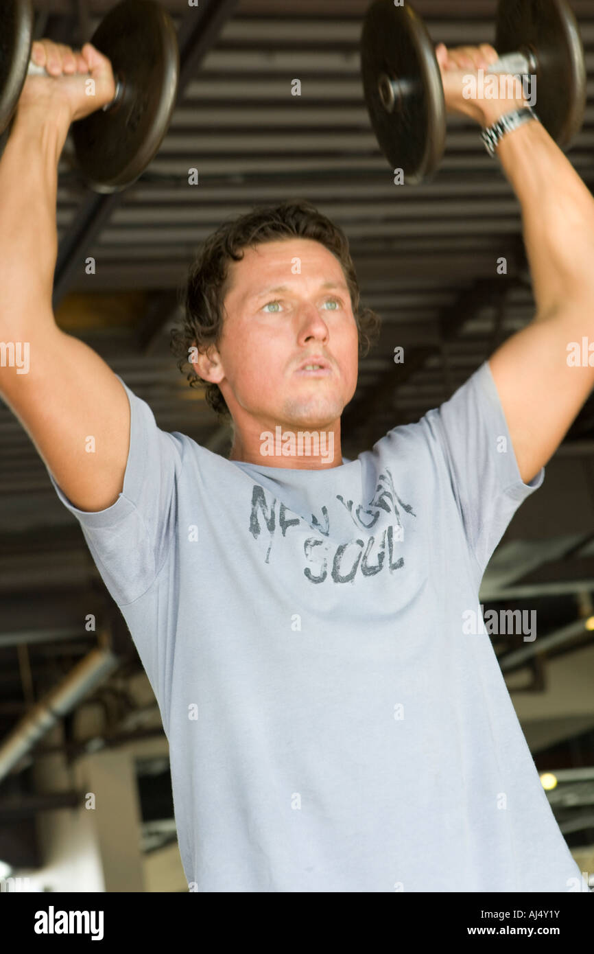 Fit male exercising in a gym Workout Stock Photo - Alamy