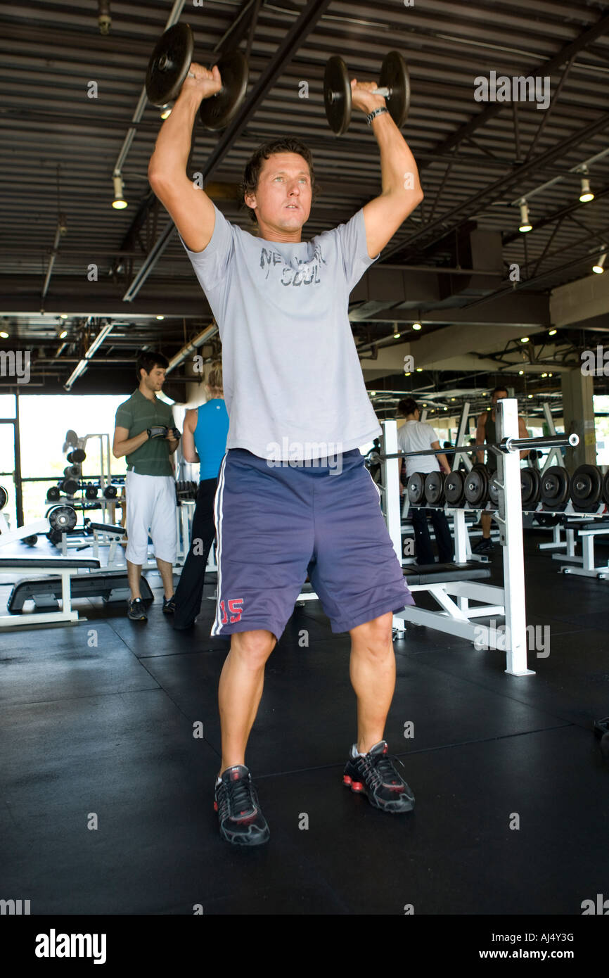 Fit male exercising in a gym Workout Stock Photo - Alamy
